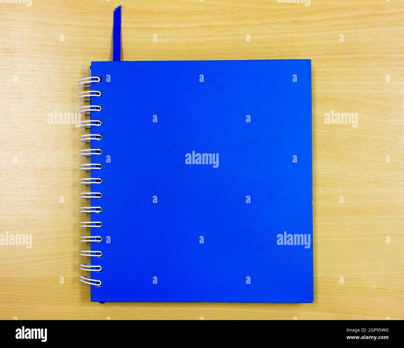 blue diary book on table office Stock Photo - Alamy
