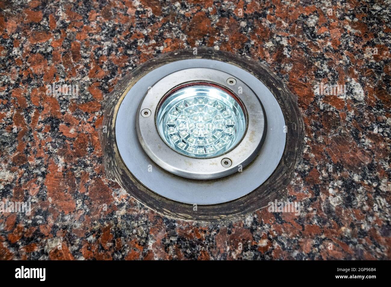 LED backlight in granite stone. Light fixture Stock Photo - Alamy