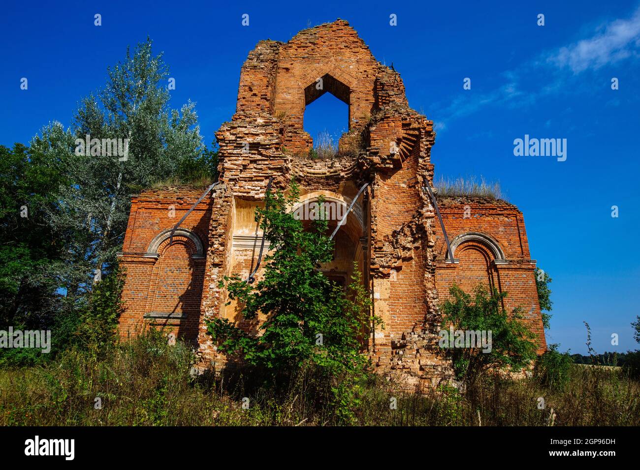 Old ancient abandoned church ruins overgrown by plants Stock Photo - Alamy