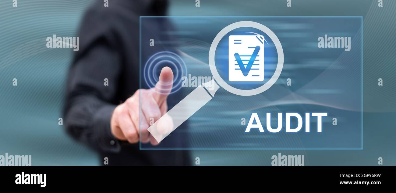 Man touching an audit concept on a touch screen with his finger Stock ...