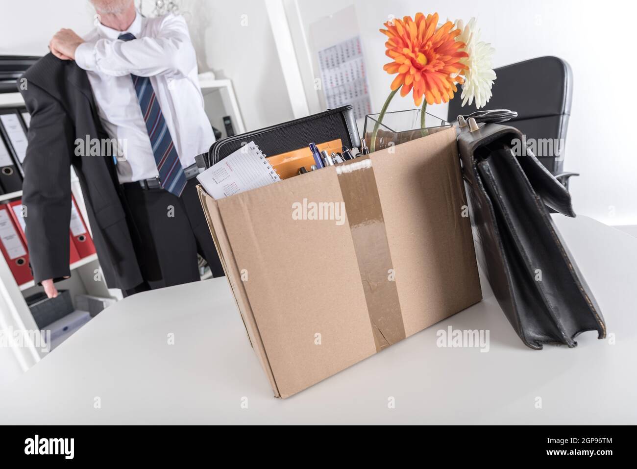 Businessman leaving office box personal hi-res stock photography and ...