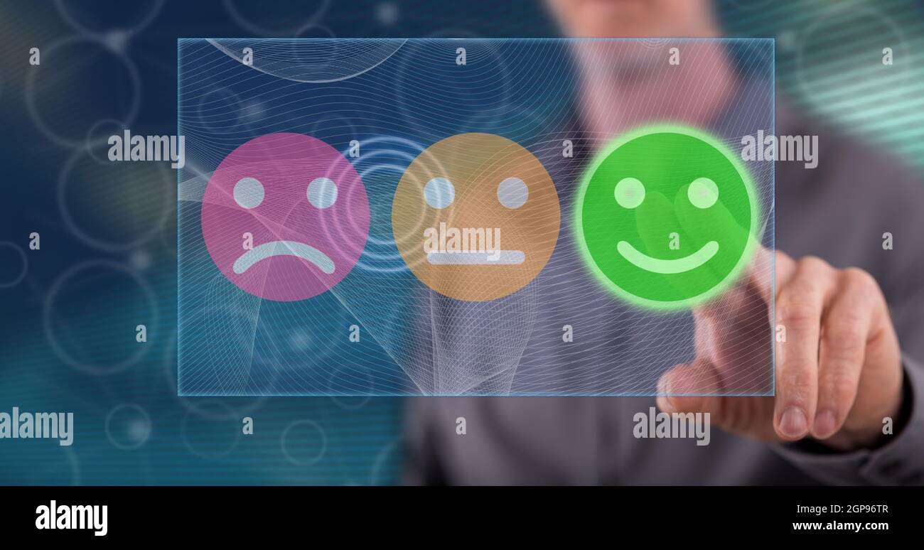 Man touching a customer satisfaction concept on a touch screen with his ...