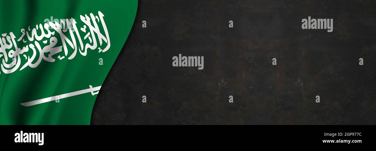 Saudi Arabia flag on concrete wall. Banner with fabric texture of the ...