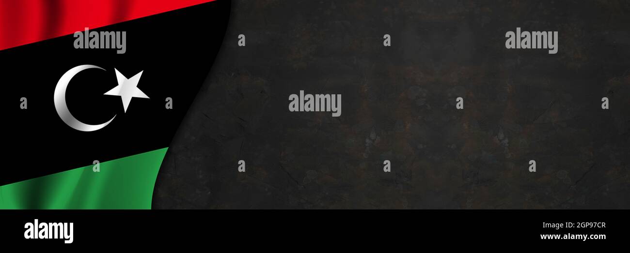 Libya flag on concrete wall. Banner with fabric texture of the flag of ...