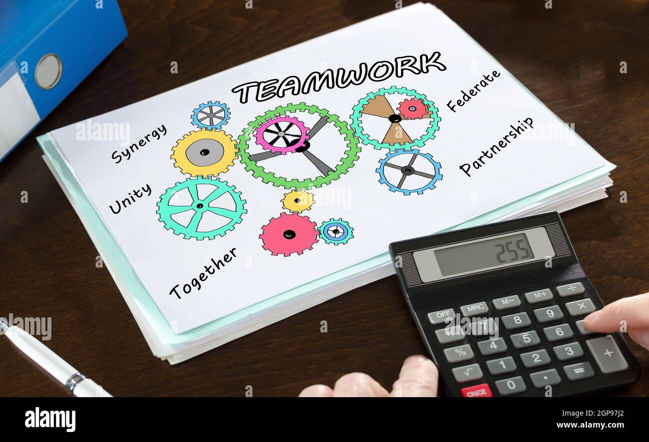 Teamwork concept illustrated on a paper with a calculator Stock Photo ...