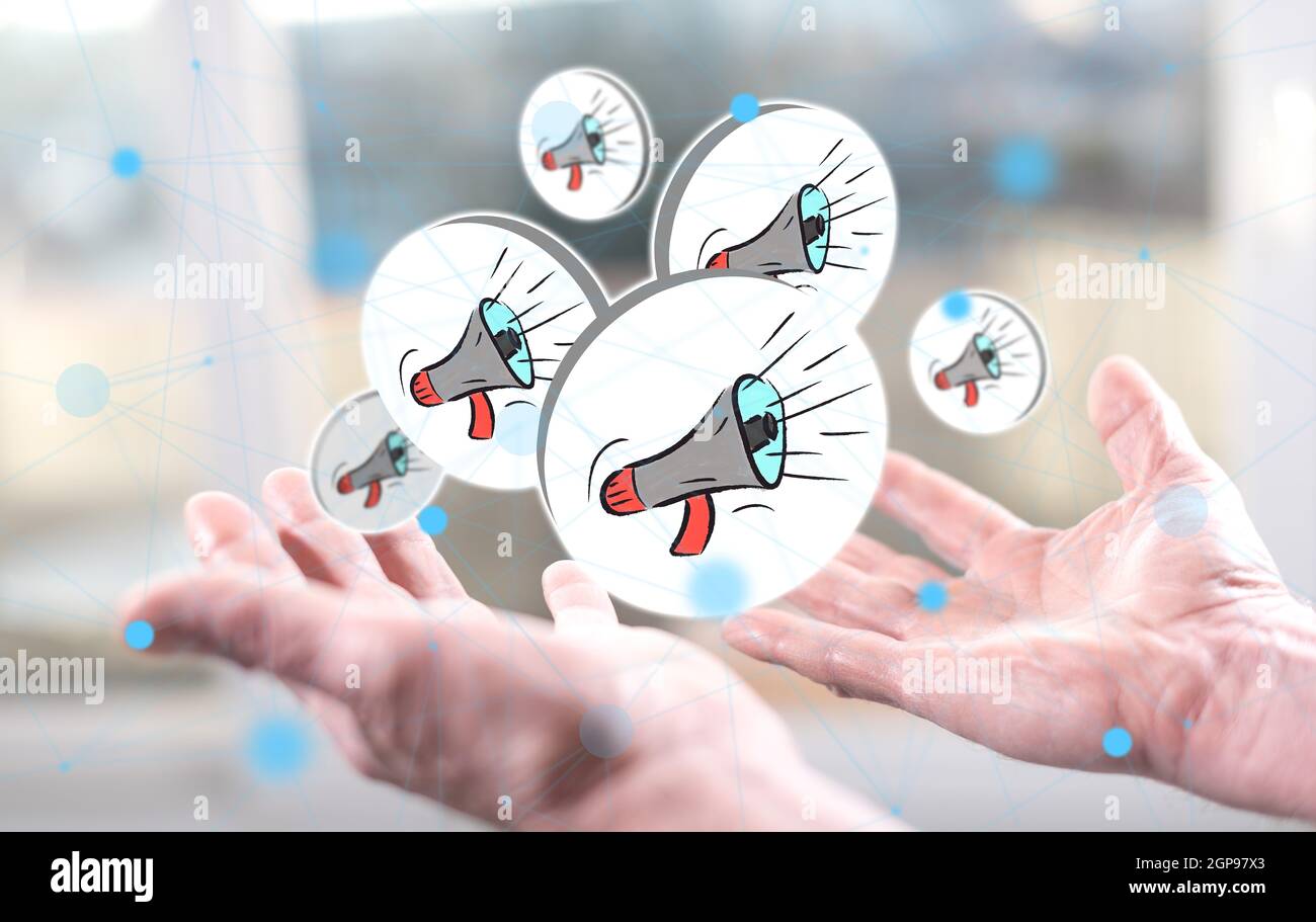 Communication concept above the hands of a man Stock Photo - Alamy