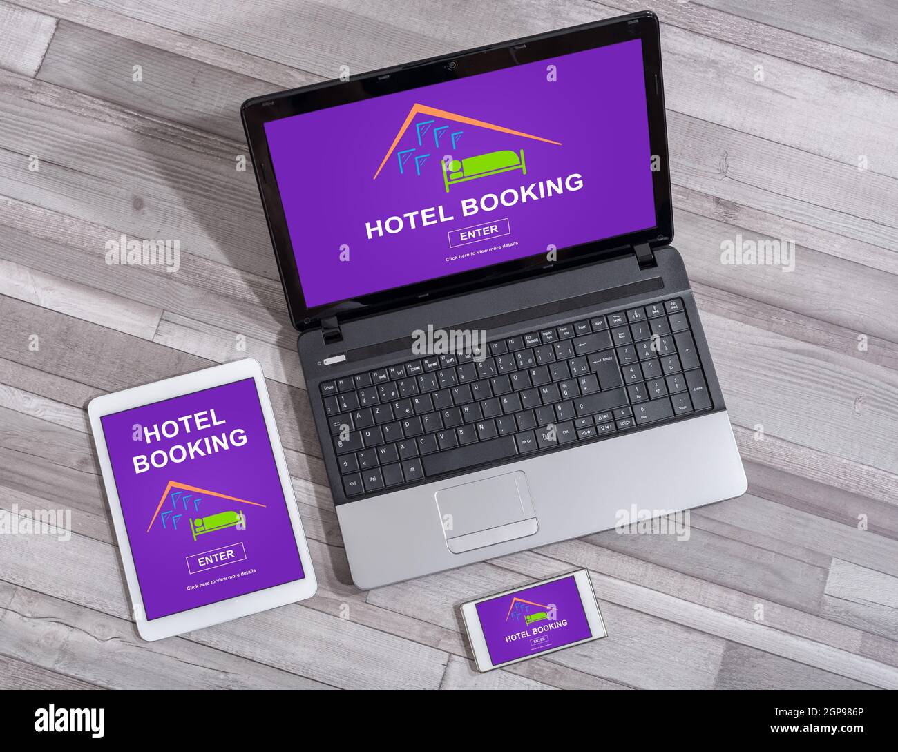 Hotel booking concept shown on different information technology devices ...