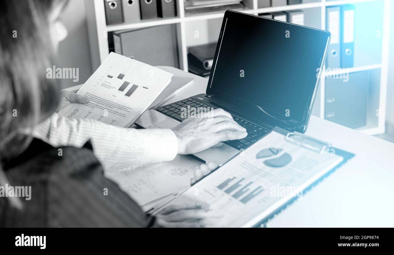 Business people showing and explaining data; multiple exposure Stock ...