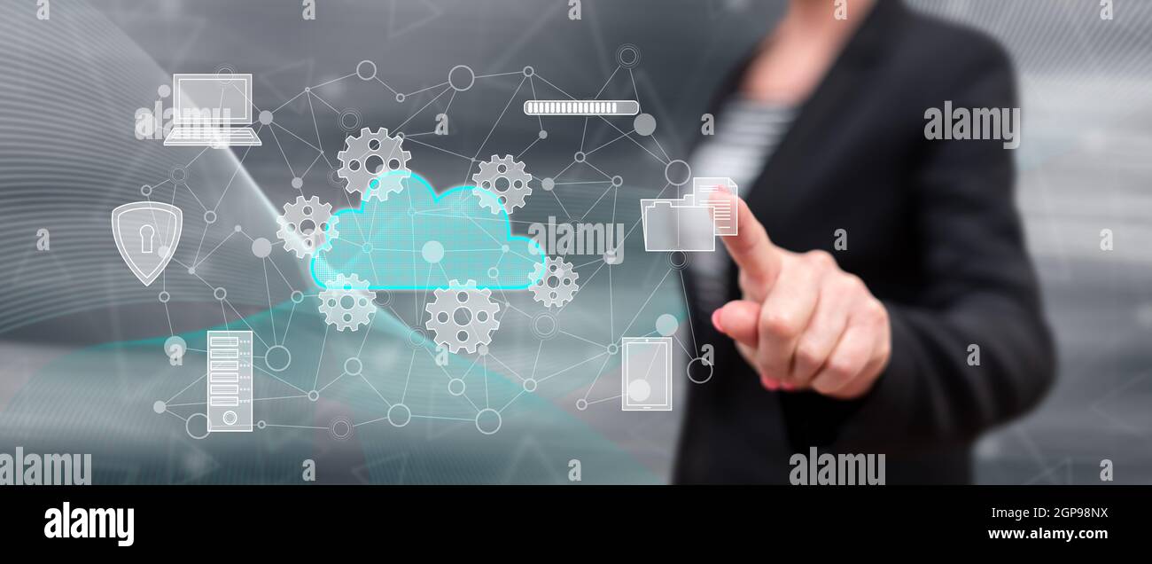 Woman touching a cloud computing concept on a touch screen with her ...