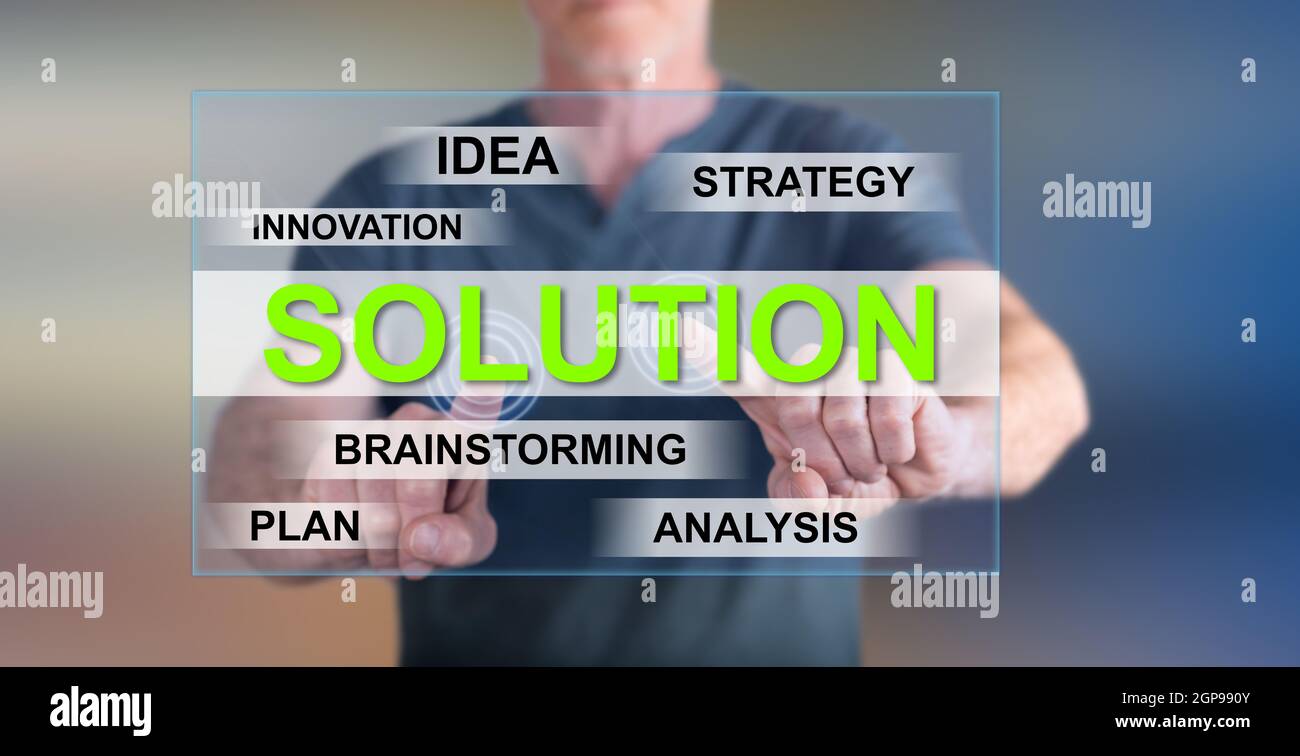 Man touching a solution concept on a touch screen with his fingers ...