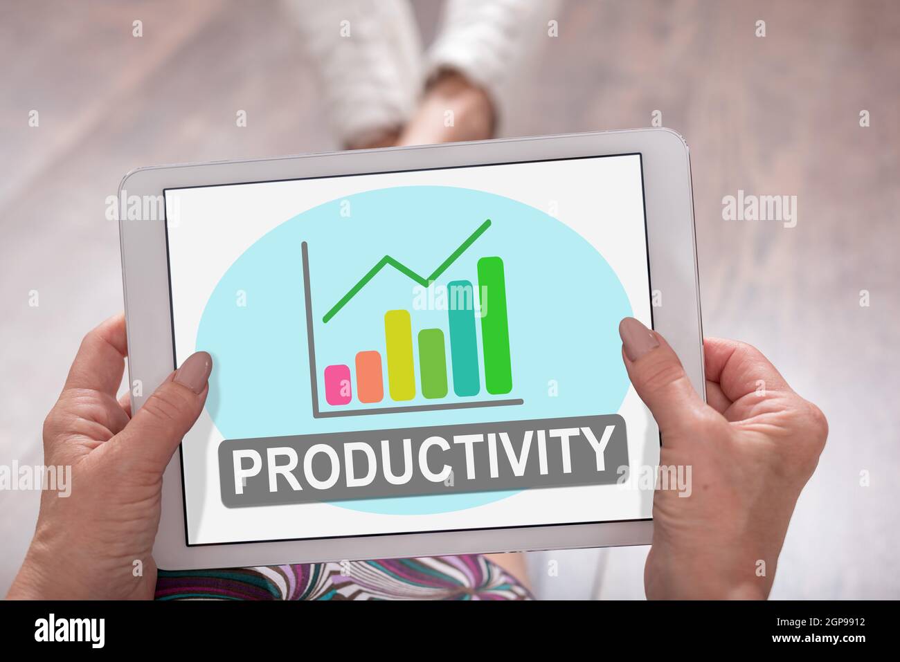 Productivity concept shown on a tablet held by a woman Stock Photo - Alamy