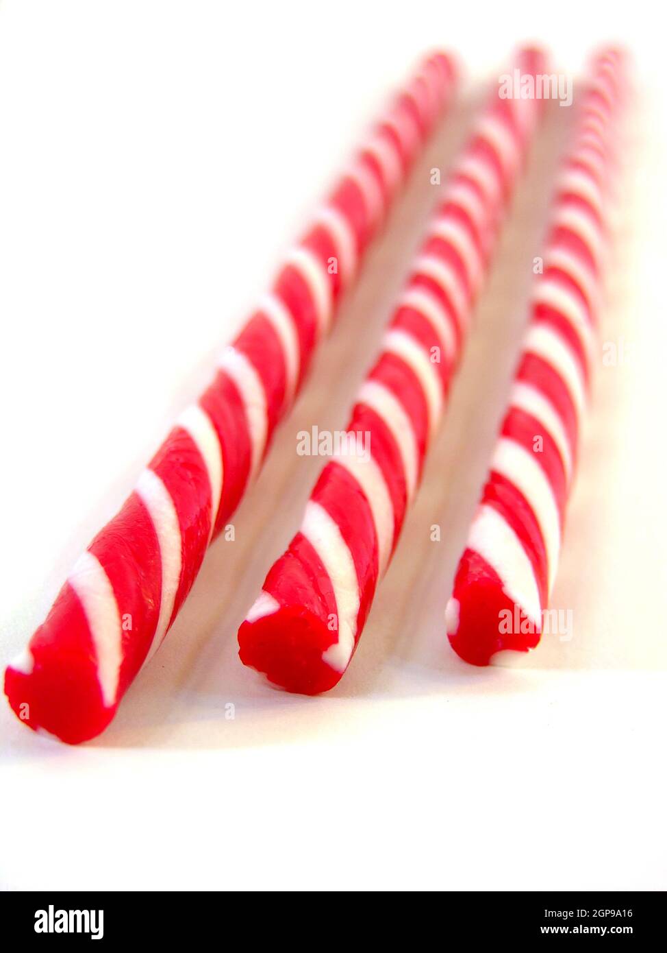 Candy cane, candy in the shape of a small stick made of colored sugar ...