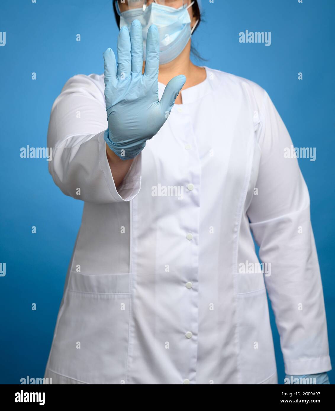 Lab worker shows warning sign hi-res stock photography and images - Alamy