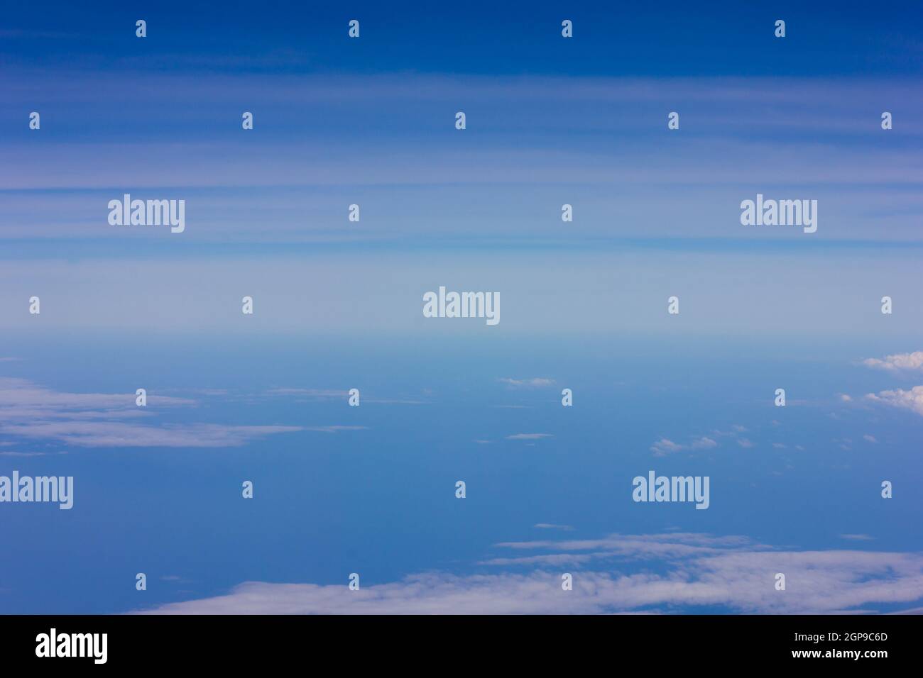 Sky and clouds bird's eye view on the plane Stock Photo - Alamy
