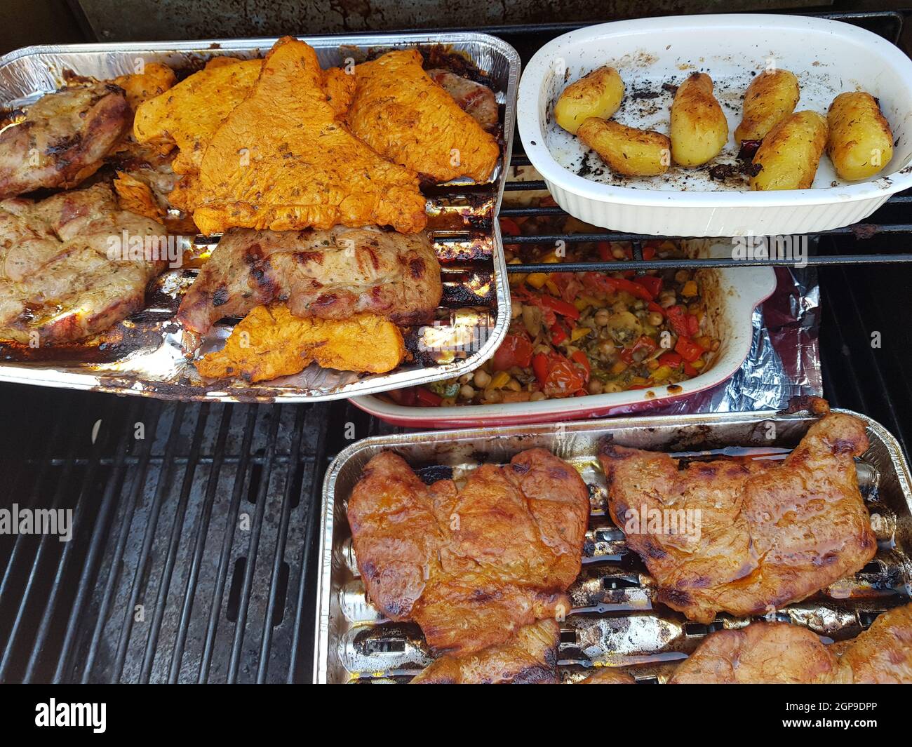 Grilled vegetables and meat on a barbecue grill , top view Stock Photo ...