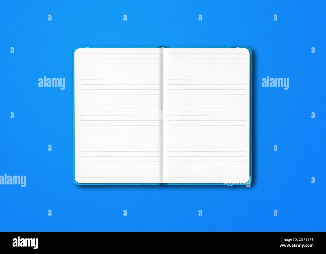 Cyan open lined notebook mockup isolated on blue background Stock Photo ...