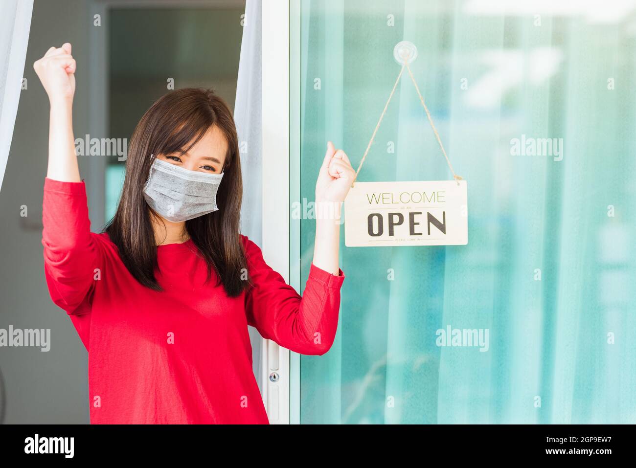 New normal Asian young woman wear face mask protect glad she notice ...