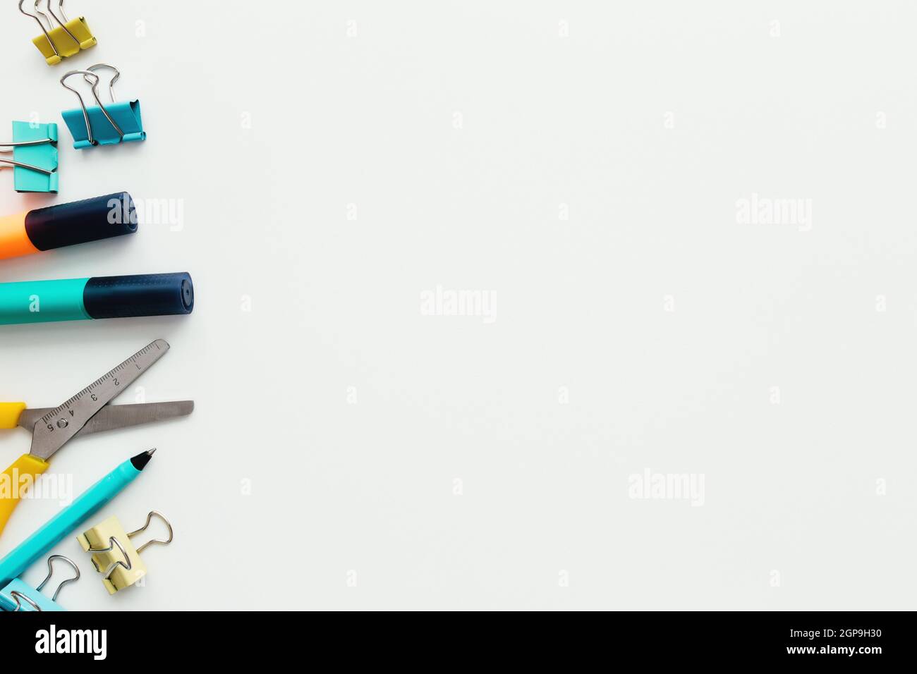 Paper clips, marker and pencil, scissors on white background. Work and ...