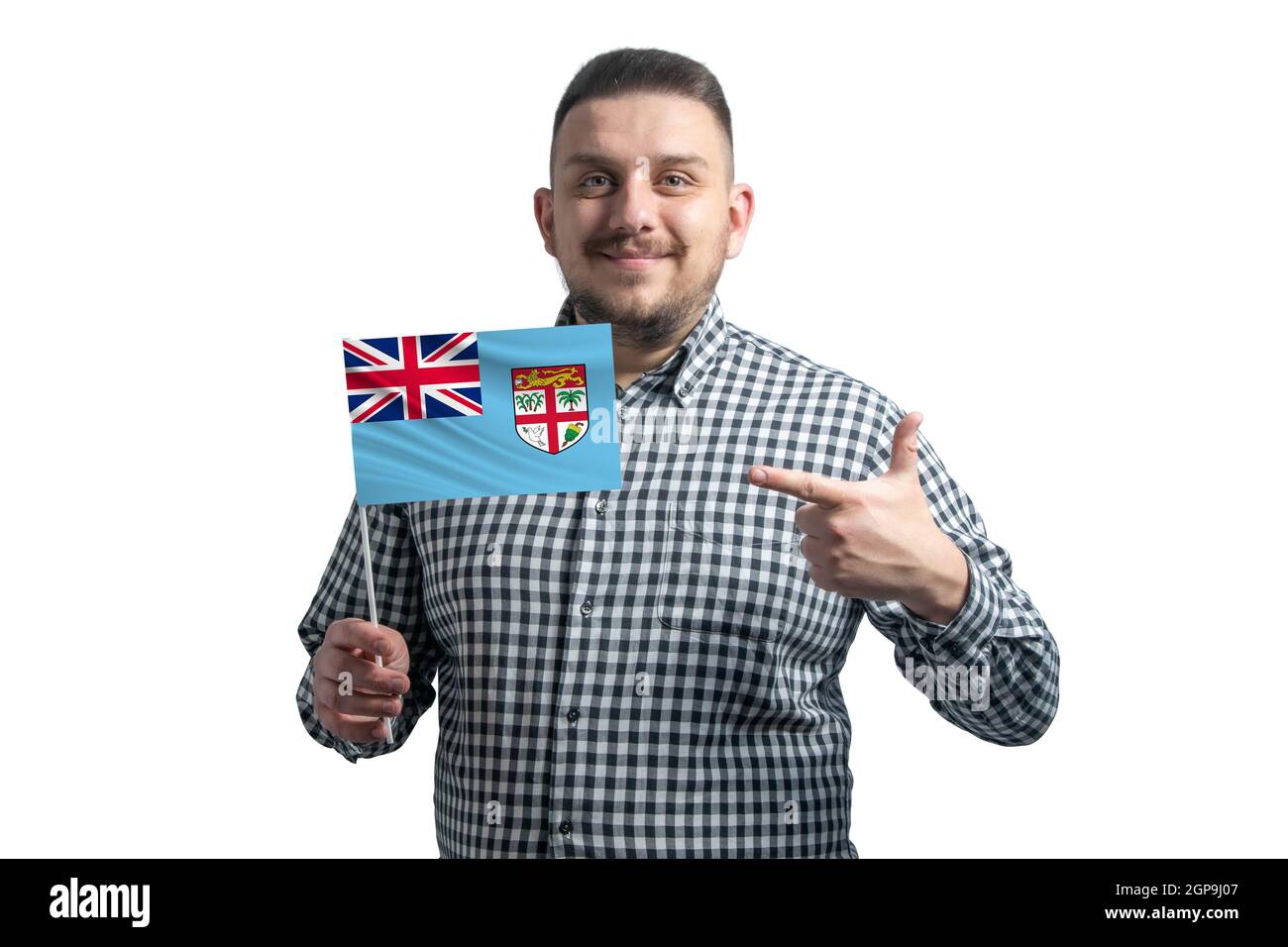 White guy holding a flag of Fiji and points the finger of the other ...