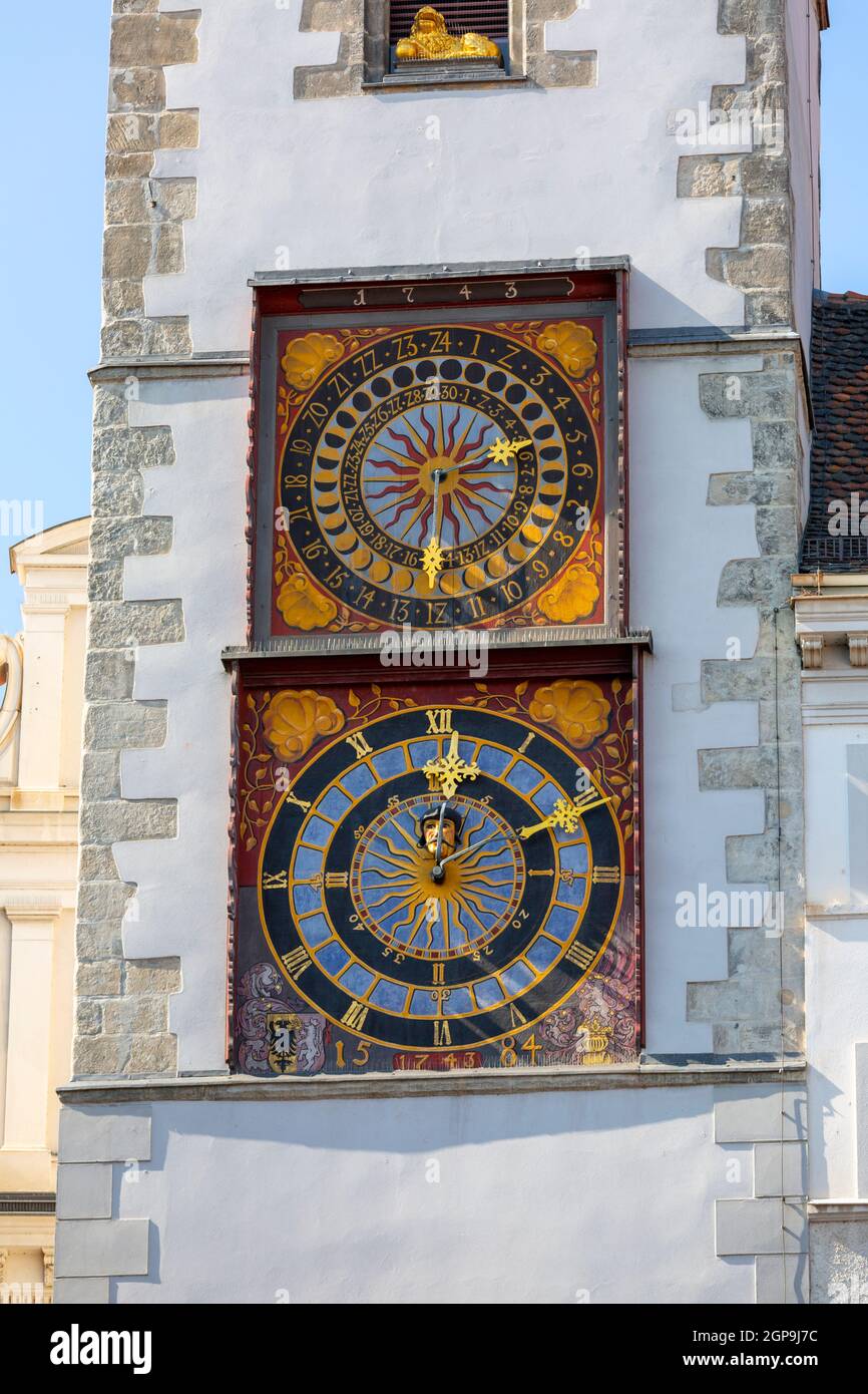 Clock with two dials and city hall lion on the tower of the 14th ...