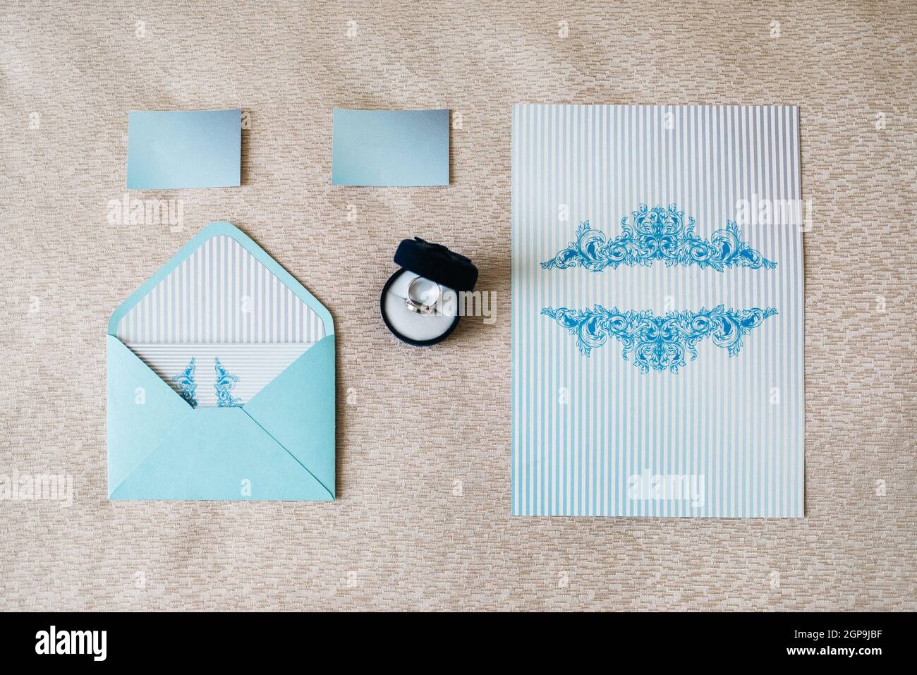 wedding rings with a wedding decor Stock Photo - Alamy