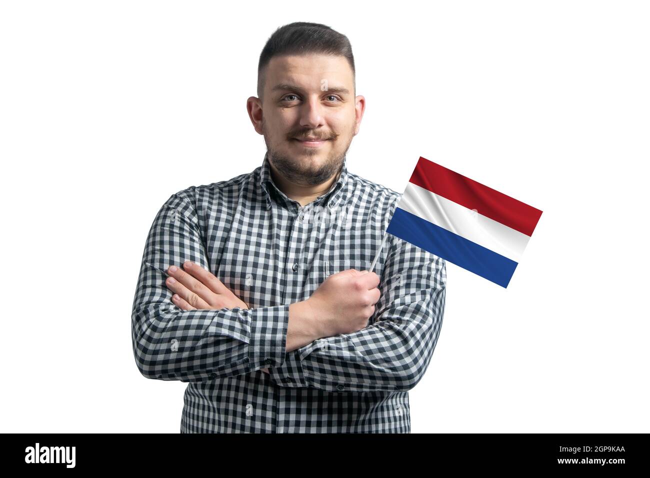 White guy holding a flag of Netherlands smiling confident with crossed ...