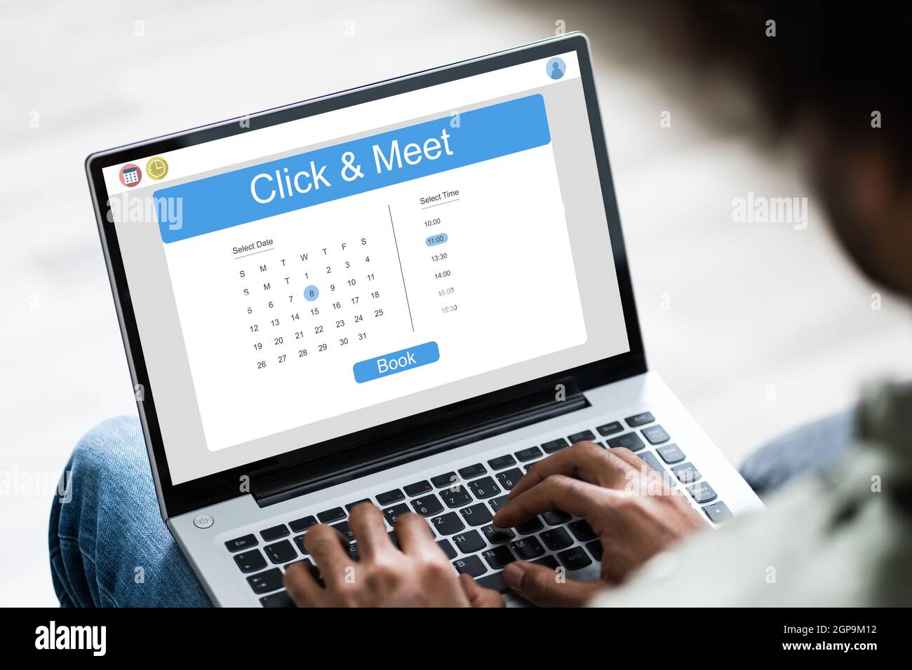 Man Booking Click And Meet Appointment On Laptop Online Stock Photo - Alamy