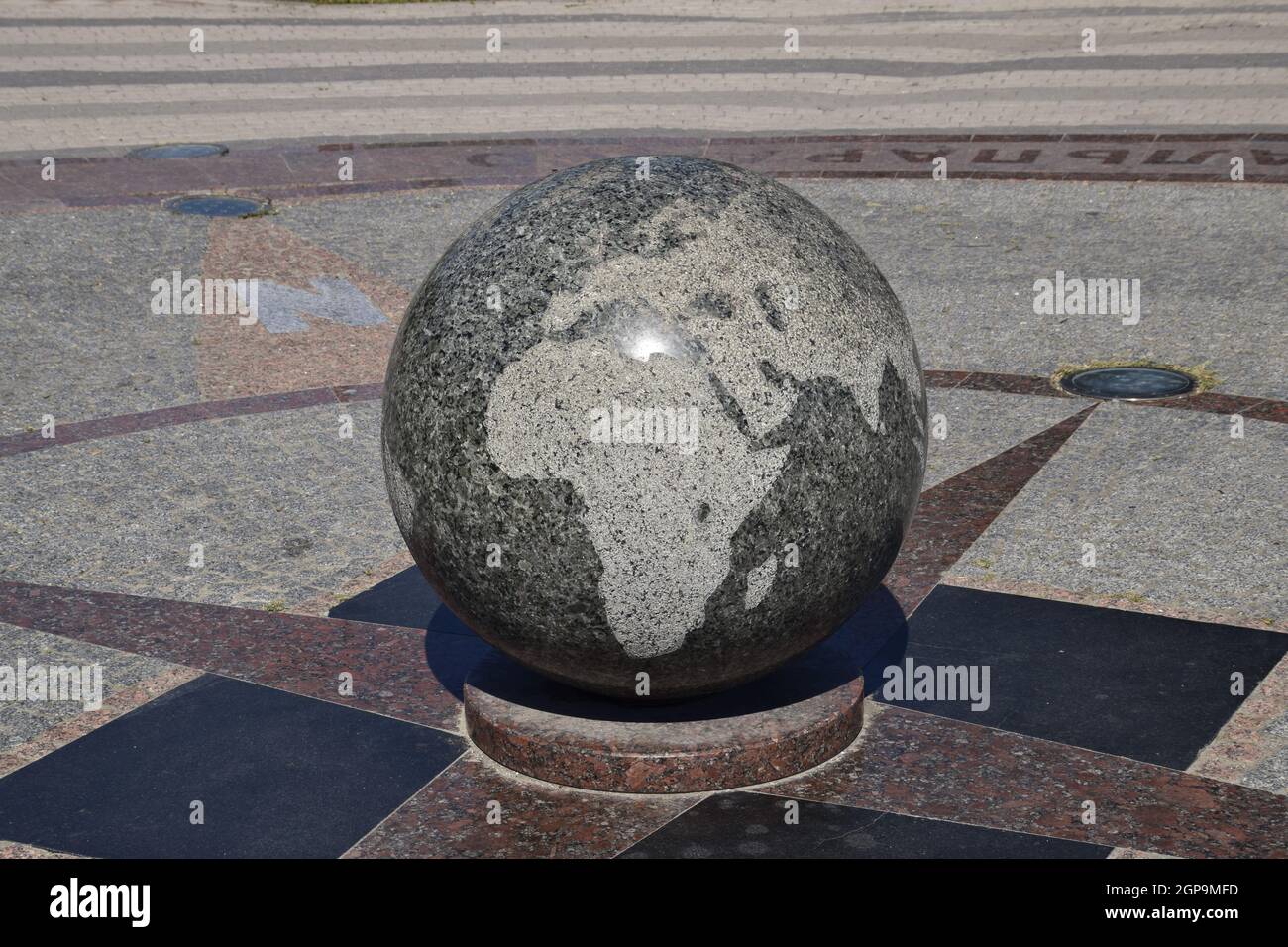 Granite bowl engraved maps of the world. The symbol of peace and unity ...