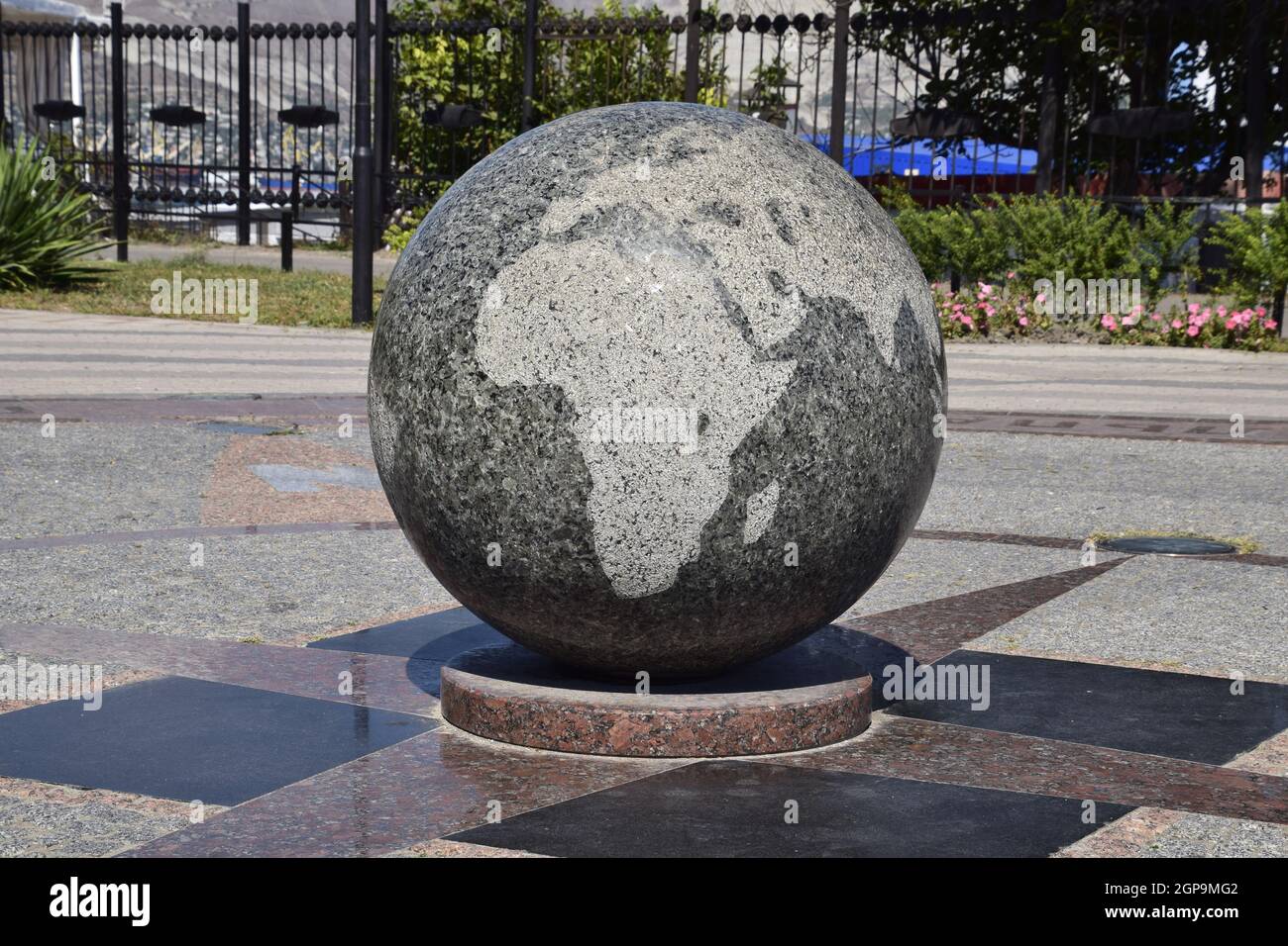 Granite bowl engraved maps of the world. The symbol of peace and unity ...