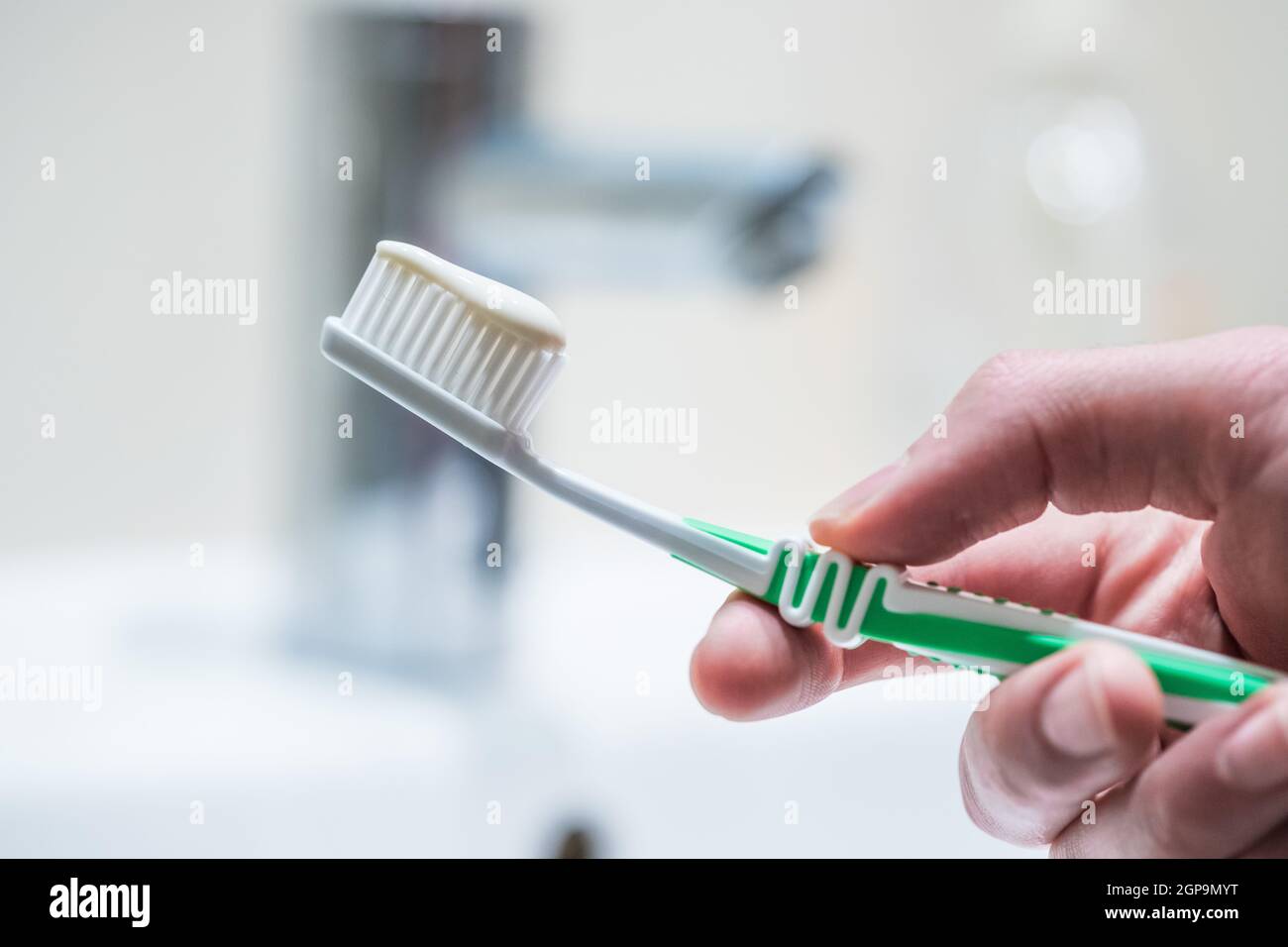 Colorful toothbrush in the bathroom, morning routine Stock Photo - Alamy