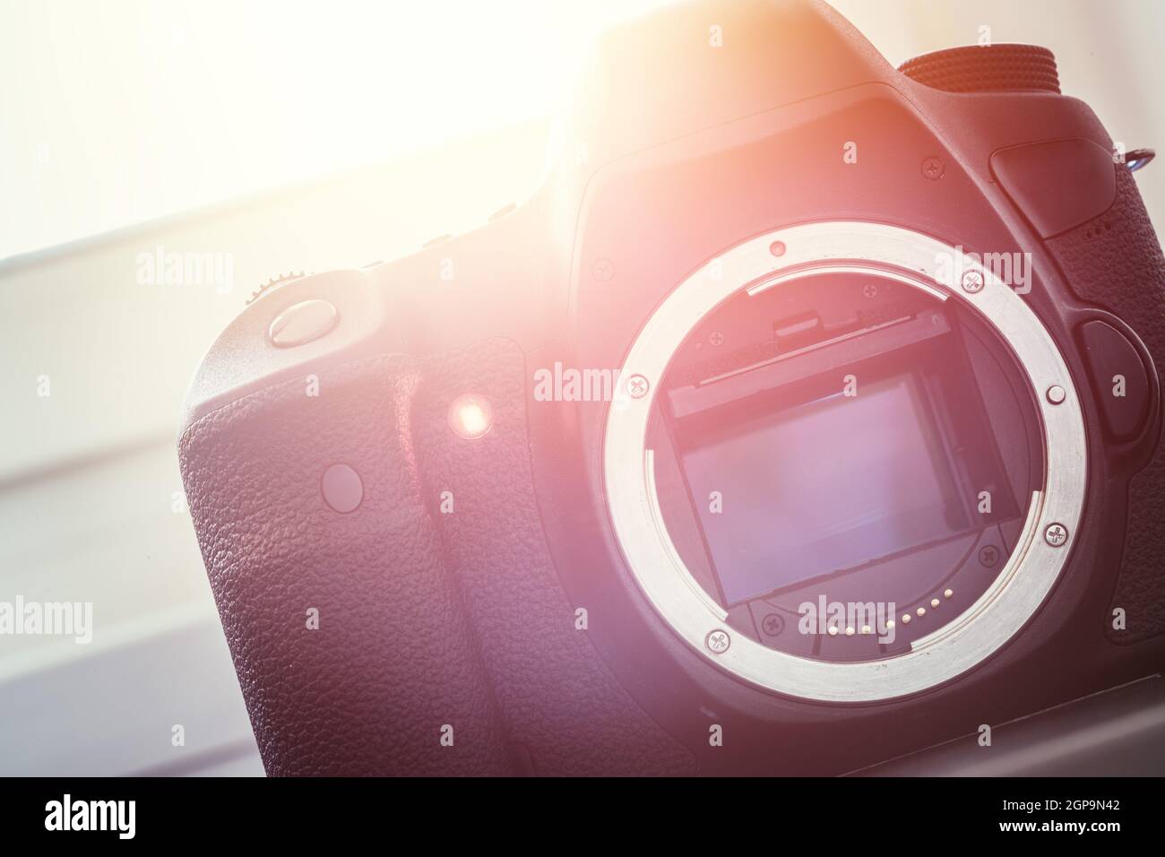 Professional reflex camera on a table, camera sensor Stock Photo - Alamy