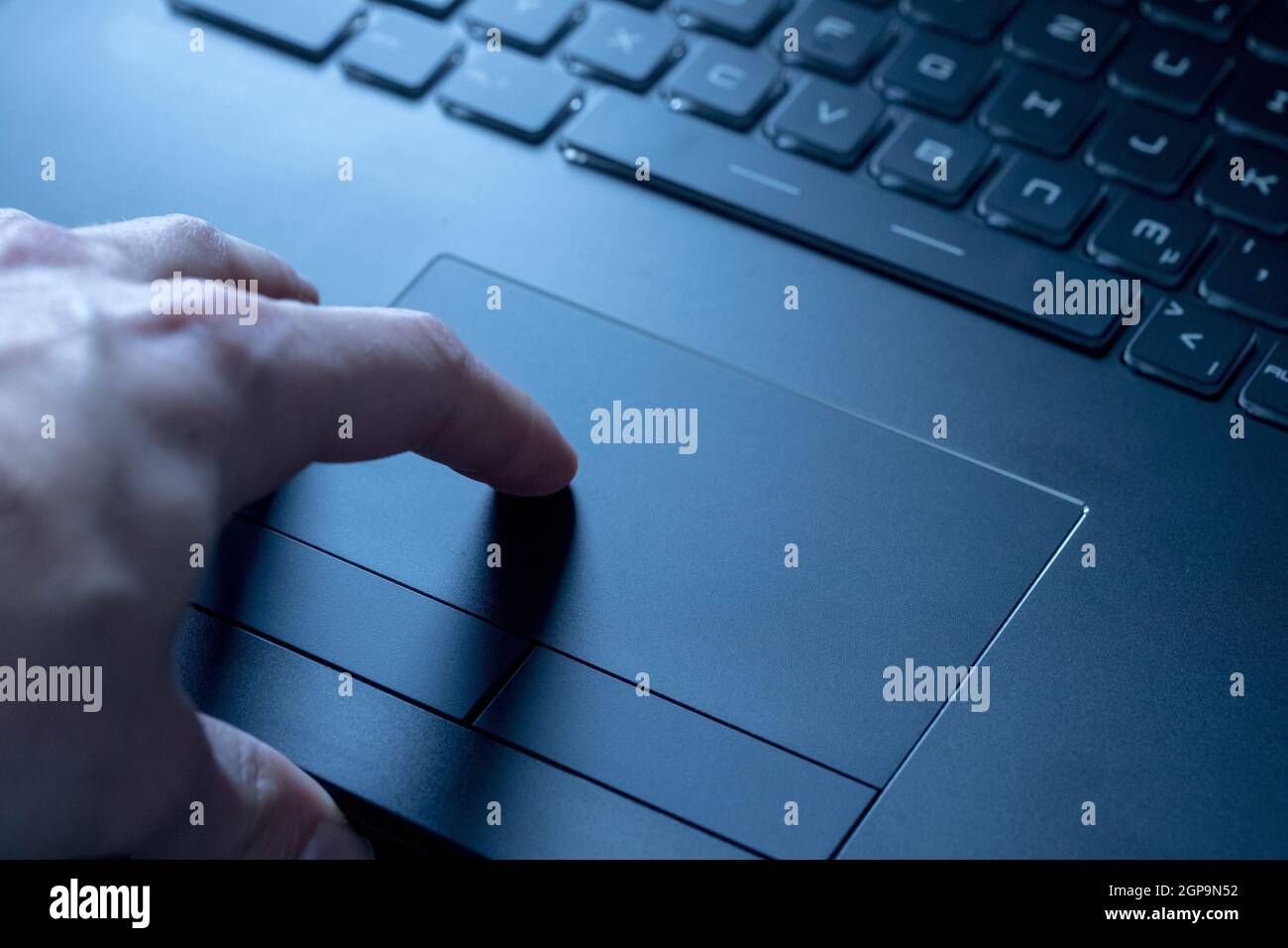Close up picture of hands using a notebook touchpad Stock Photo - Alamy