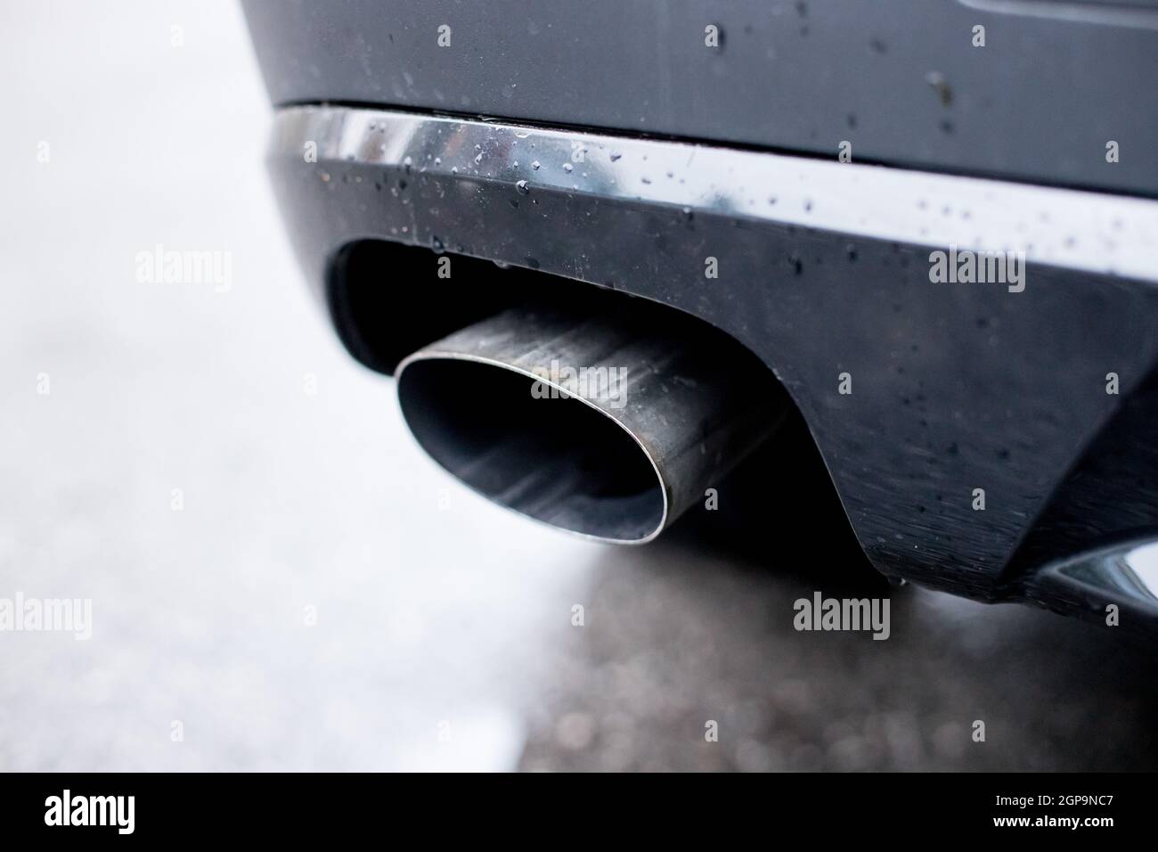 Close up of an exhaust pipe of a car, environmental pollution Stock ...