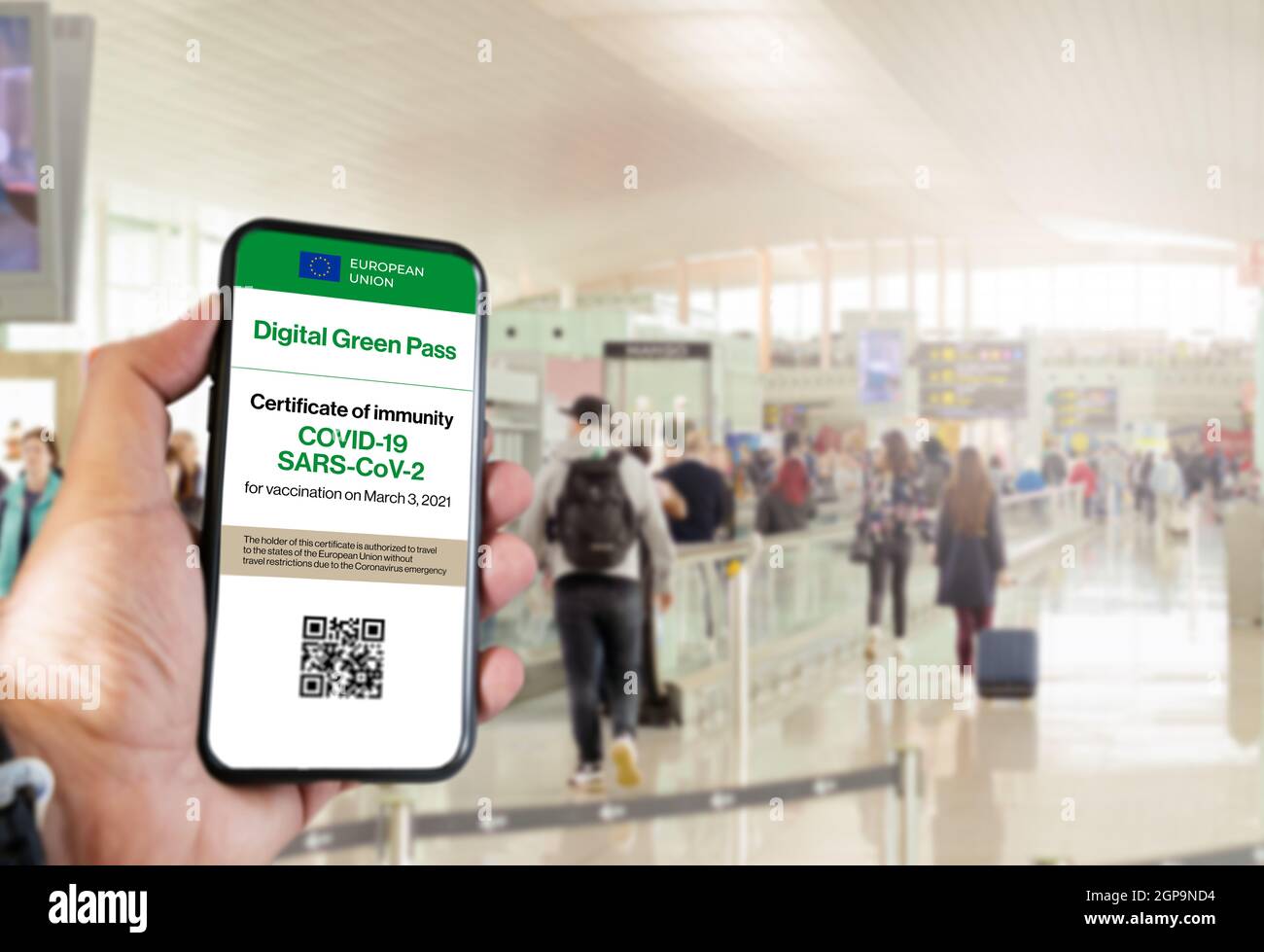 The digital green pass of the european union with the QR code on the ...