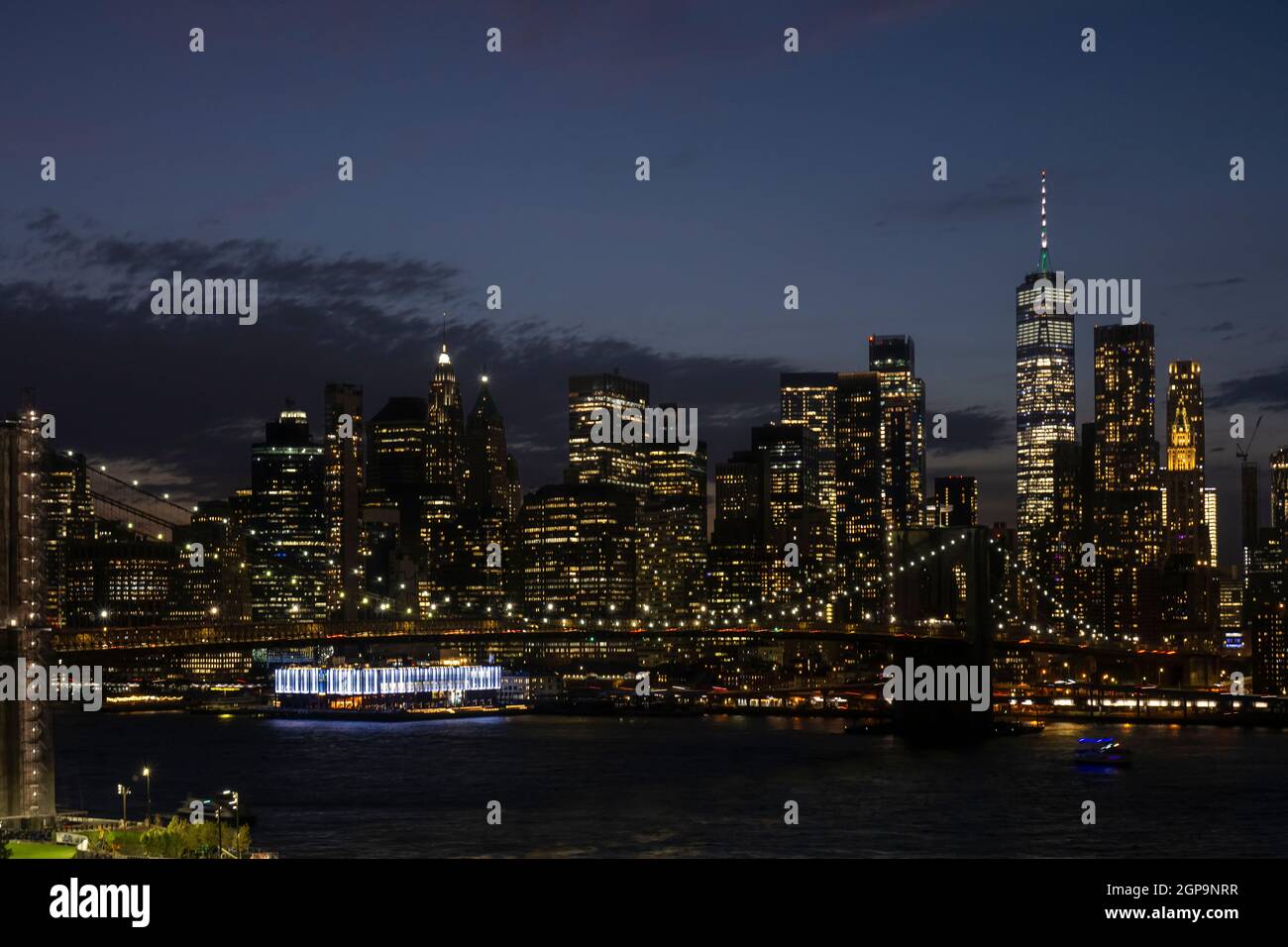 View of lower Manhattan and Financial district at night. Skyscrapers ...