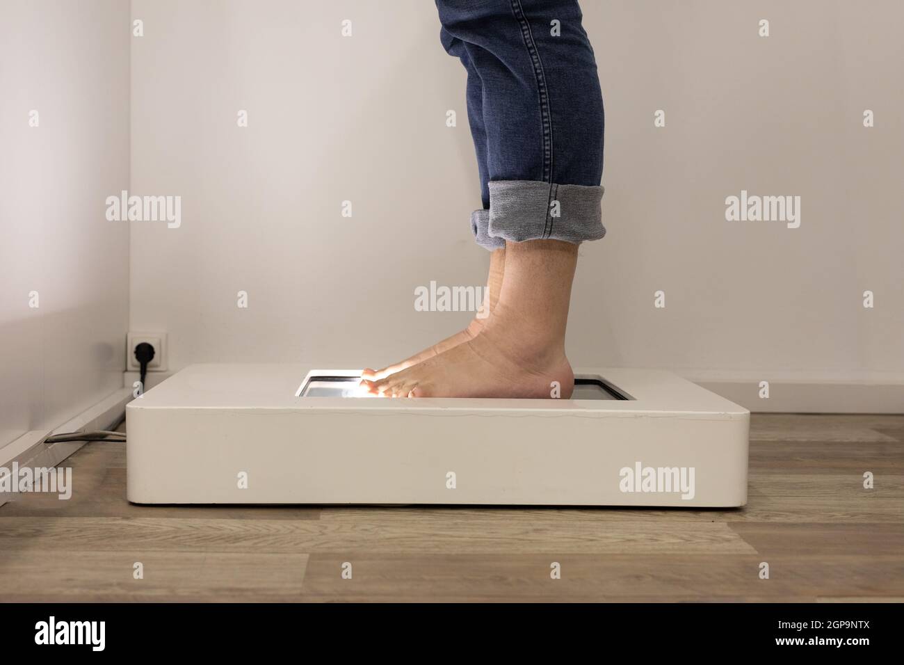 Foot scanning to determine exact size and feet form. Man using the ...