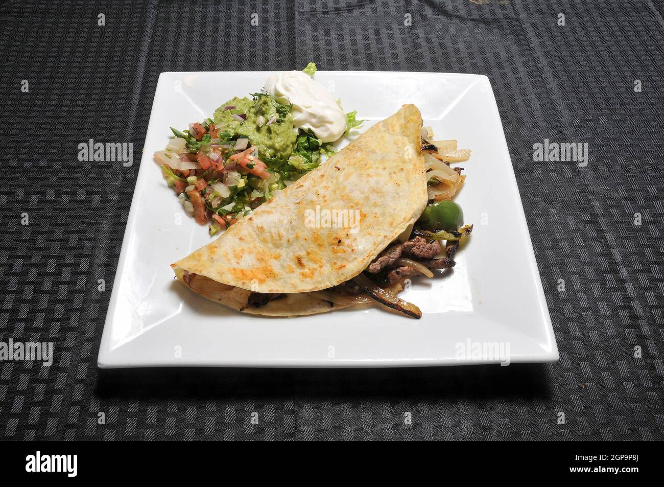 Traditional mexican delicacy known as a quesadilla Stock Photo - Alamy