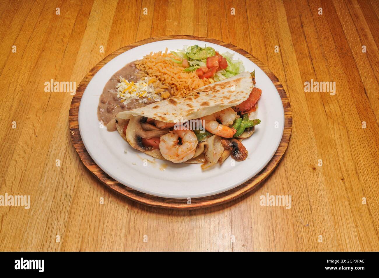 The mexican delicacy known as a shrimp quesadilla Stock Photo - Alamy