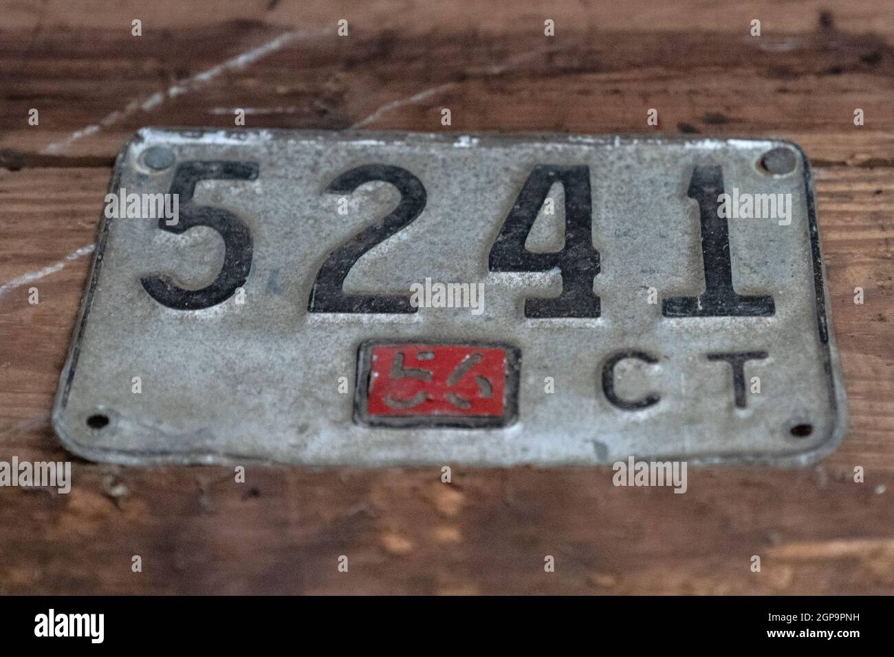 Antique very old vehicle license plate Stock Photo - Alamy