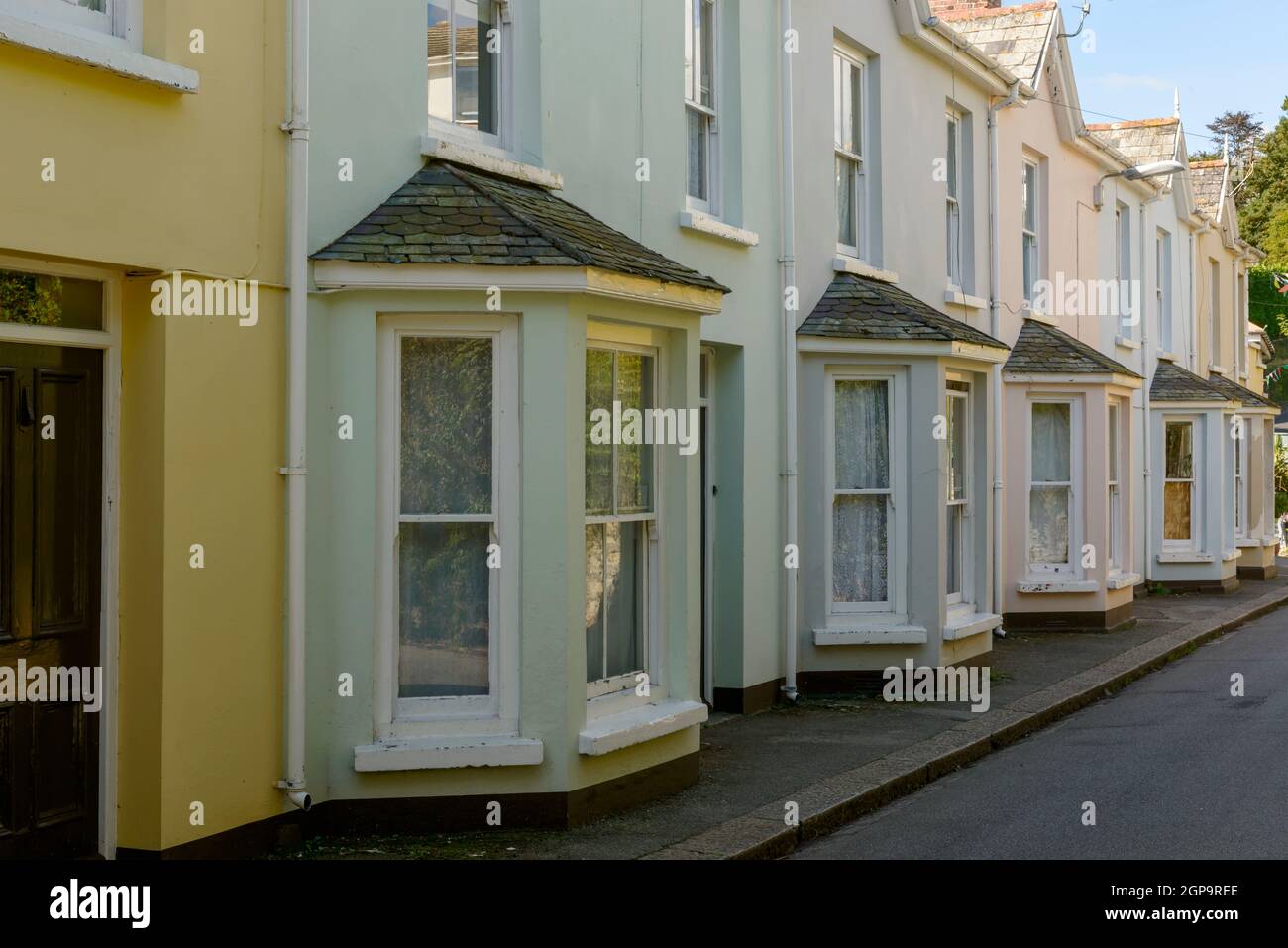 view of a row of bow windows of terrace houses in the village on ...