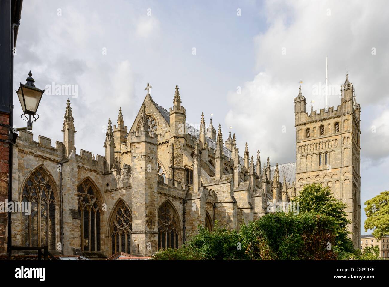 rear view of ancient stone church in historic town of Devon Stock Photo ...