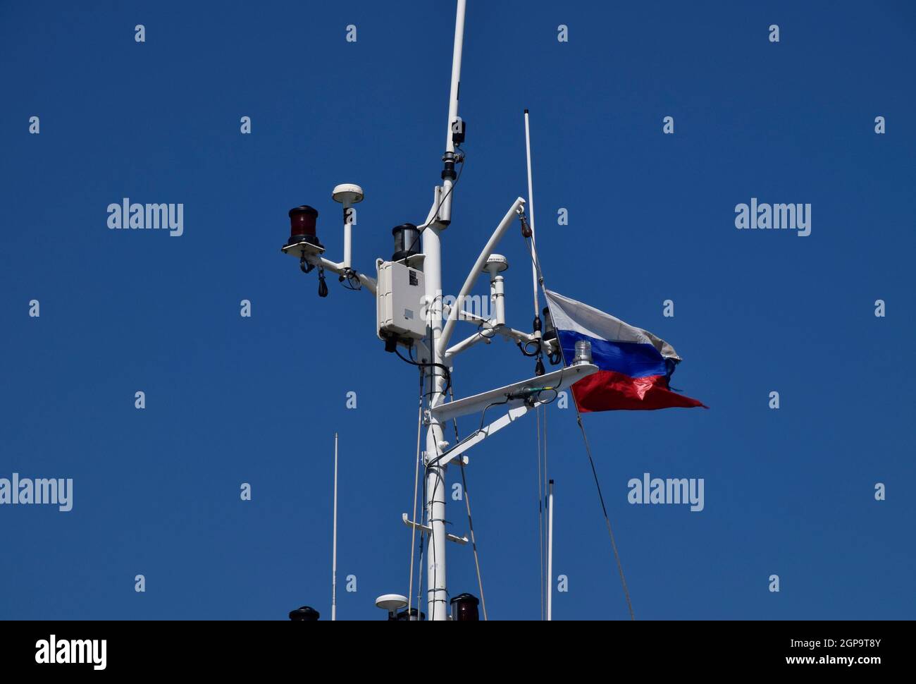 Mast of the port service ship. Devices of light signaling and ...