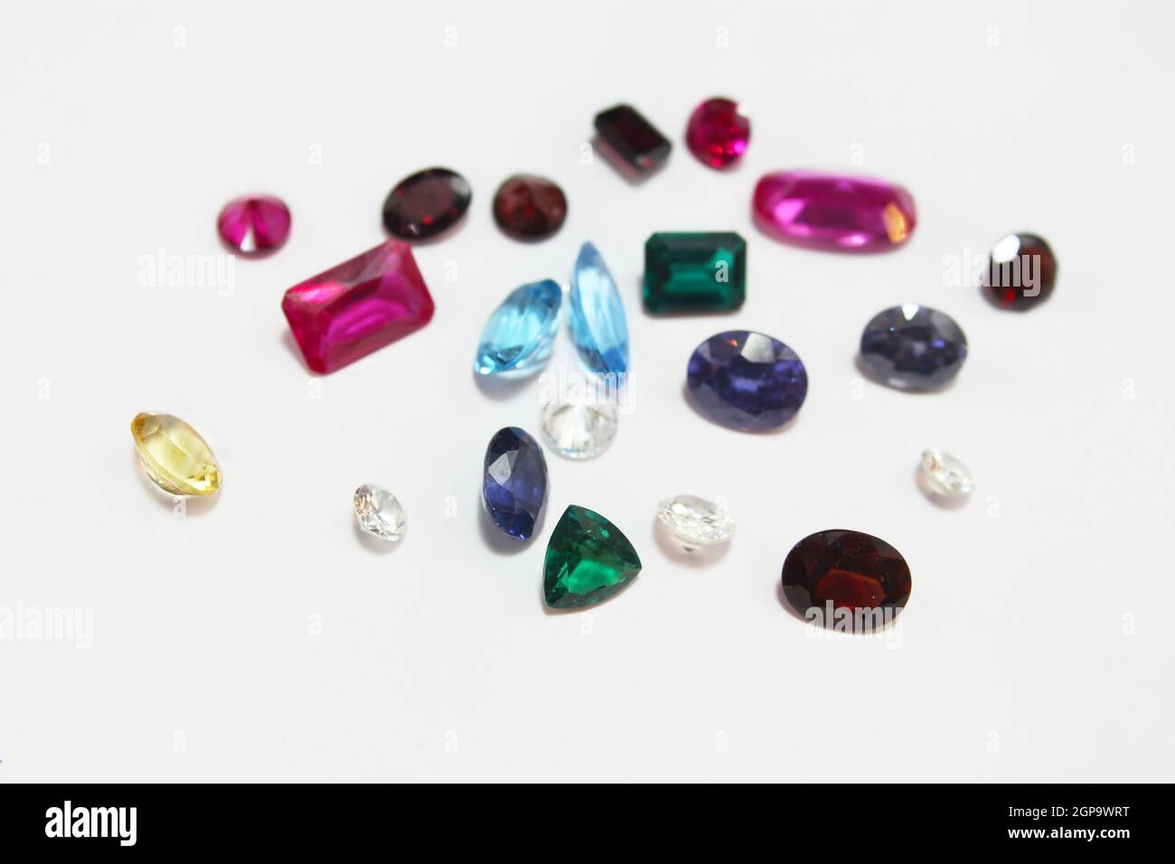 Colorful Gems and Gemstones on white background Stock Photo - Alamy