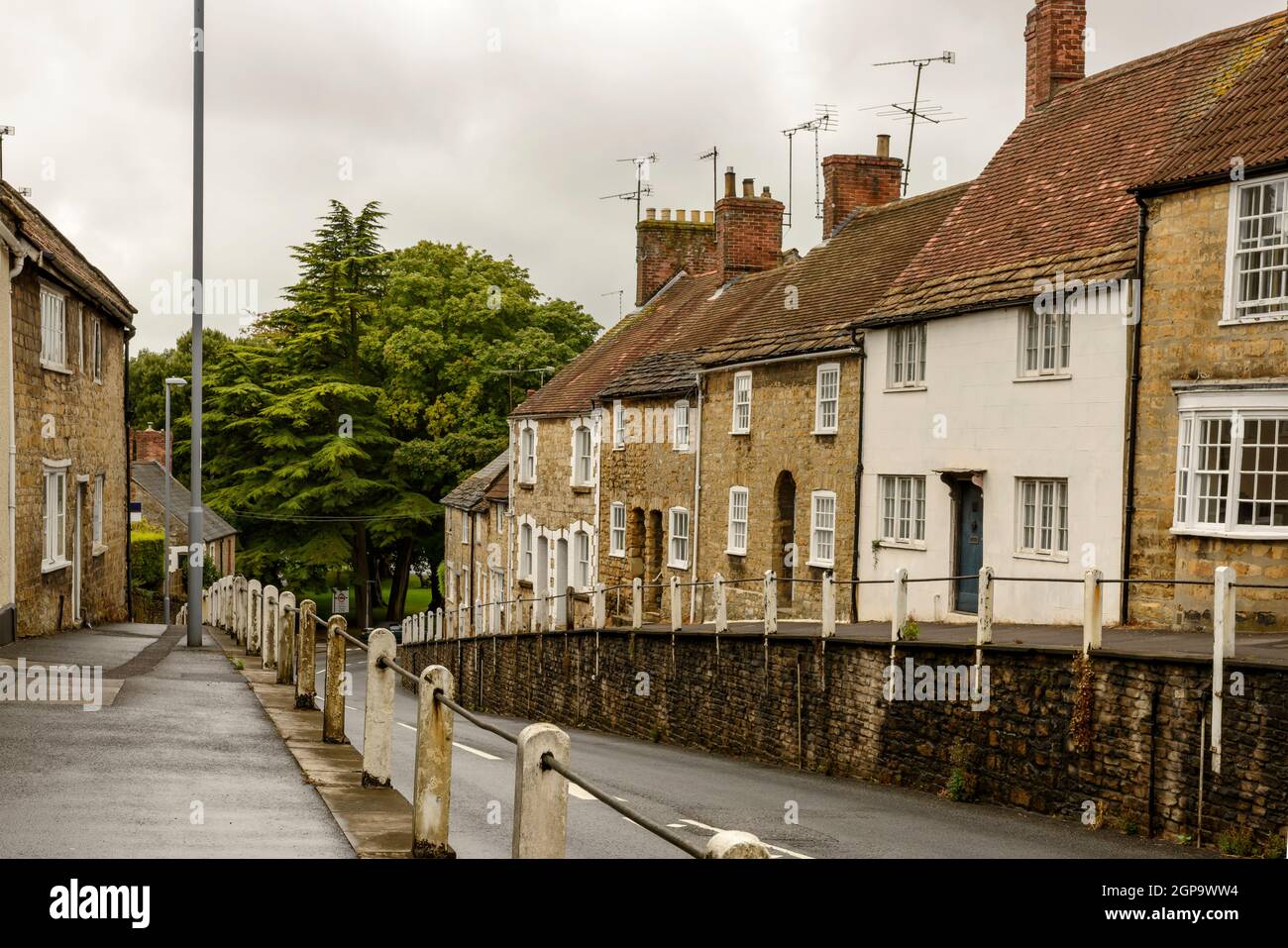 view of old houses and downhill street in the historic village Stock ...
