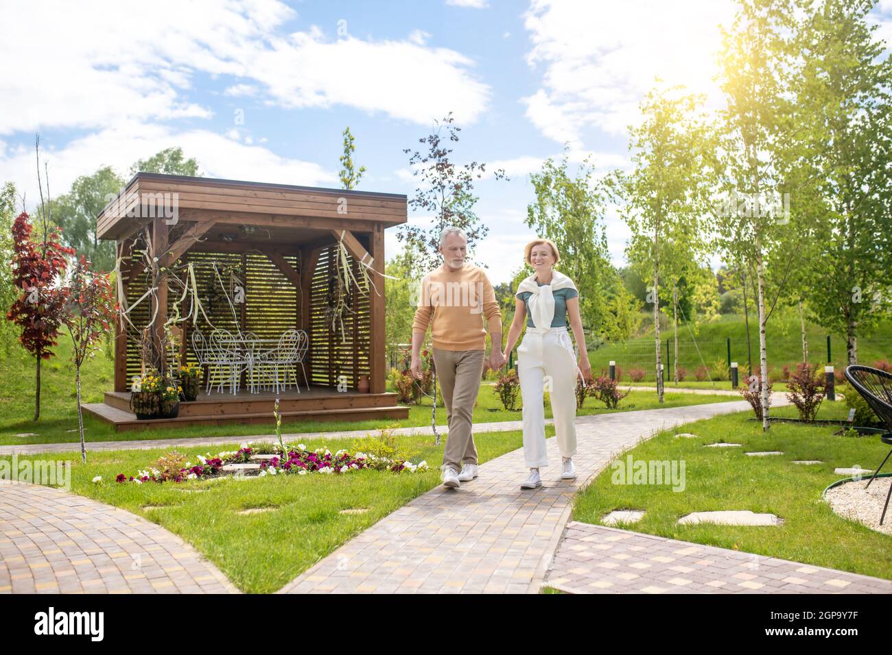 Couple strolling hand in hi-res stock photography and images - Alamy