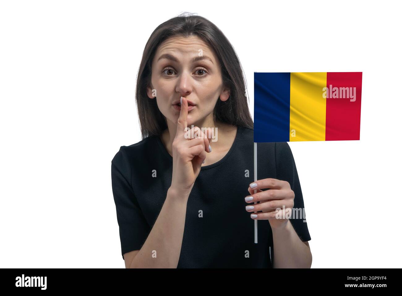 Happy young white woman holding flag of Chad and holds a finger to her ...