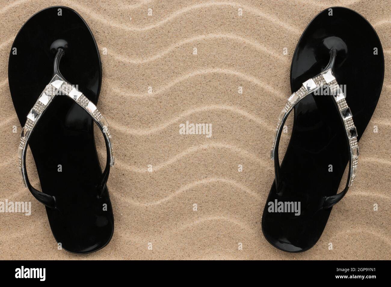 Black beach sandals hi-res stock photography and images - Alamy