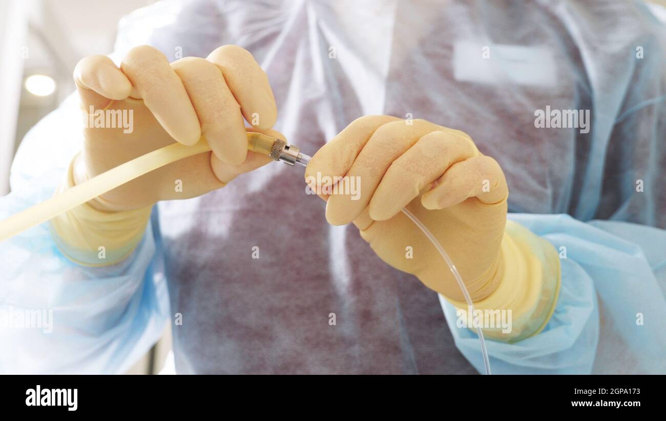 Hands Of The Doctor In Protective Gloves Before Manipulations Of Artificial Insemination
