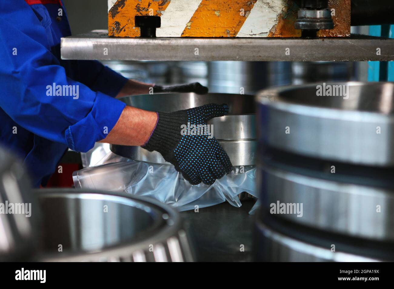 Packaging of finished bearings for production. Storage of finished ...