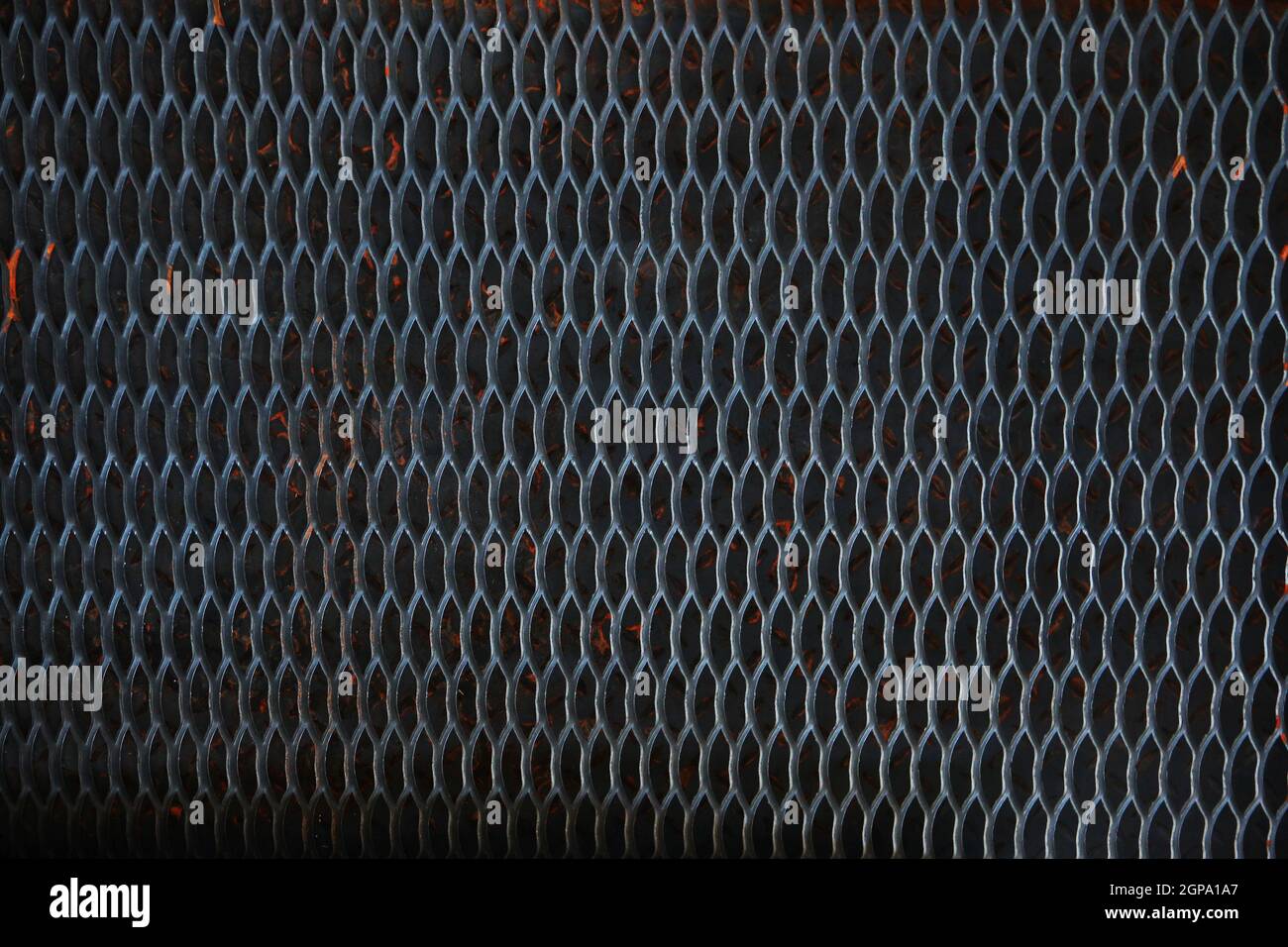 Metal grating. Textured grating in production. The product is made of ...